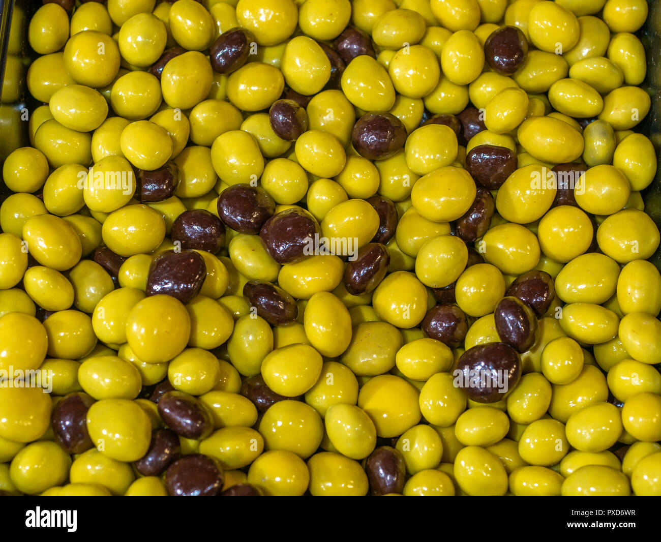 Yellow and brown chocolate background Stock Photo - Alamy
