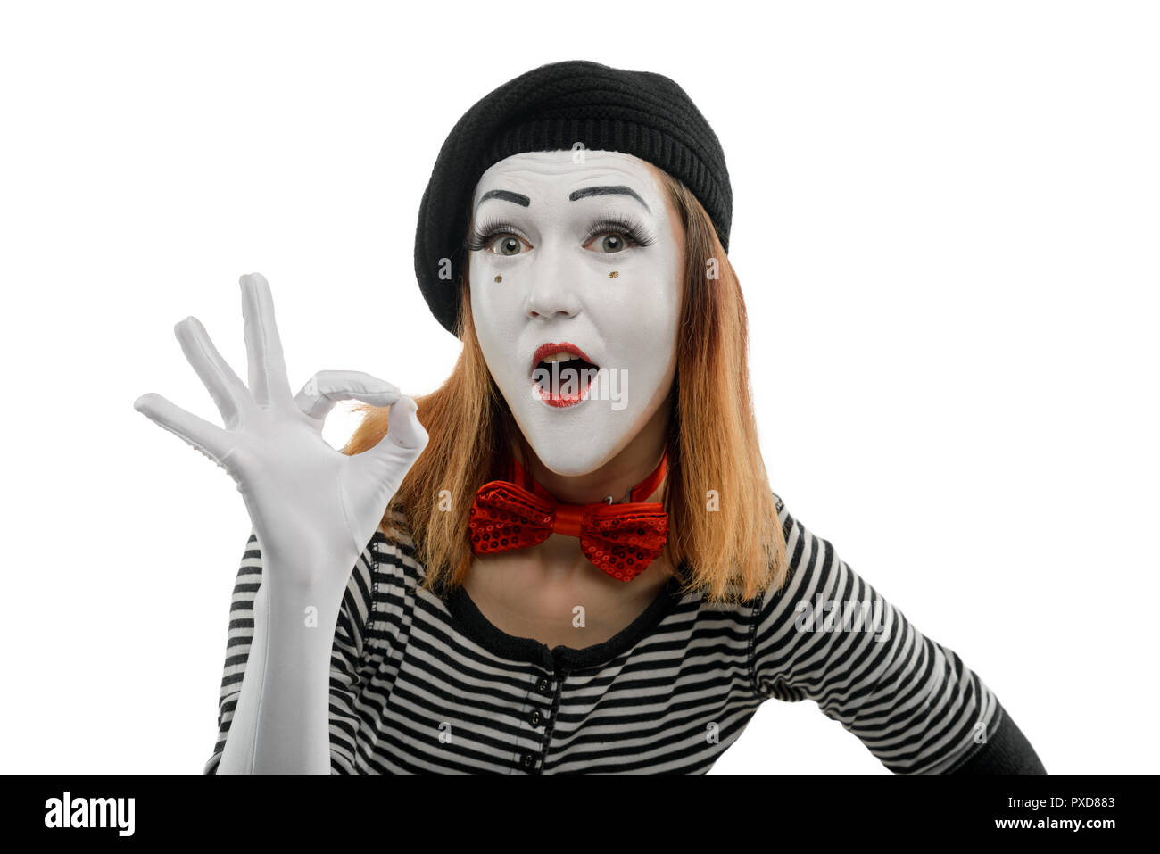 Female mime showing OK sign Stock Photo - Alamy