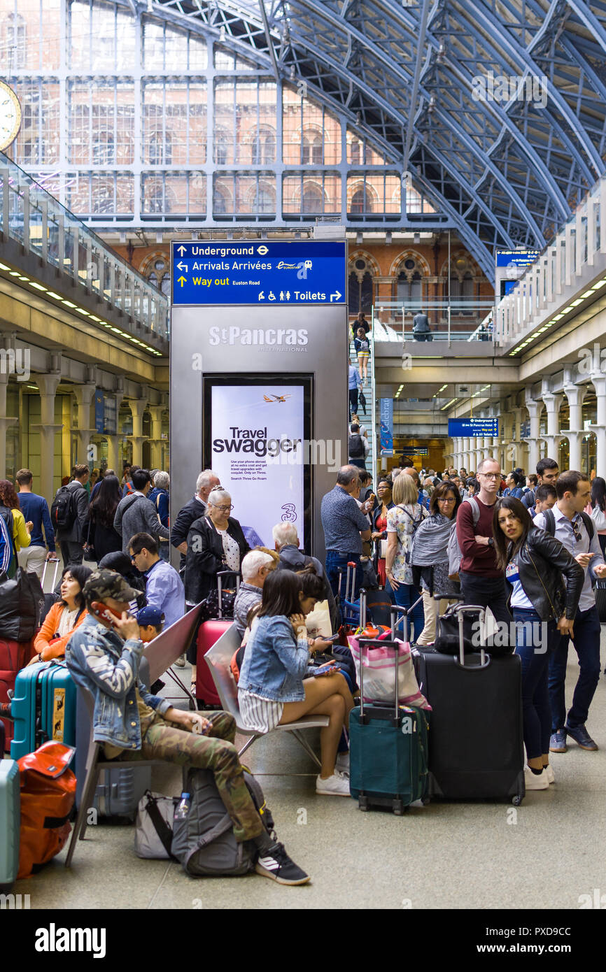Passengers and shoppers in the Arcade area of St Pancras International ...