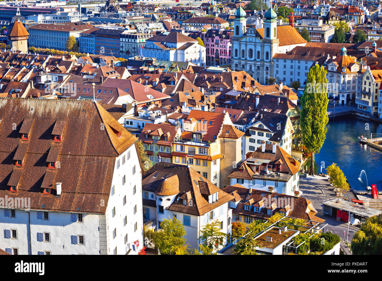 City of Luzern riverfront and rooftops aerial view, Alps landscape of ...