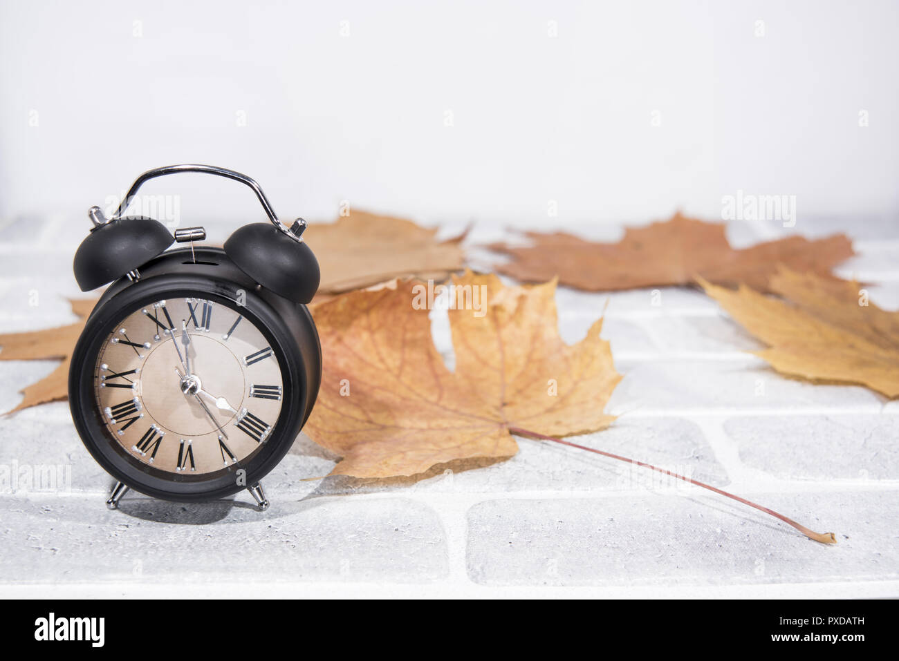 Daylight Saving Time. Wall Clock going to winter time. Autumn ...