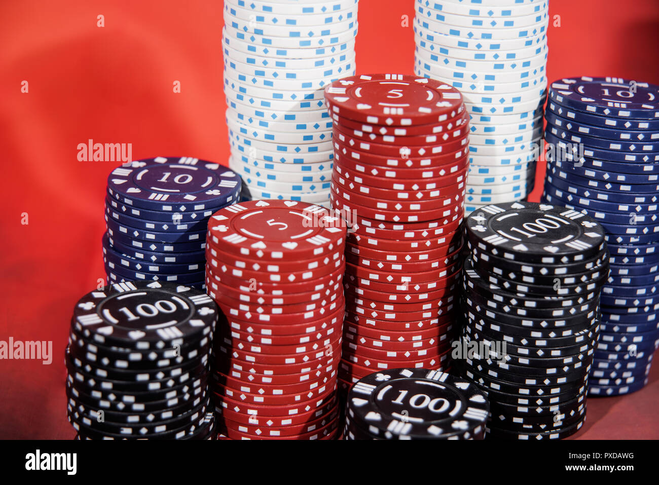Casino abstract photo. Poker game on red background. Theme of gambling ...