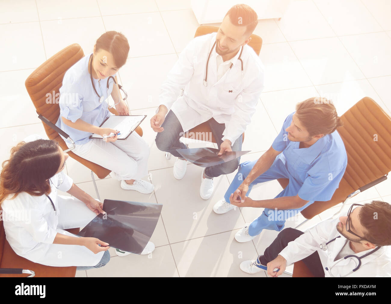 medical staff ,discussing the work plan with the patients Stock Photo ...