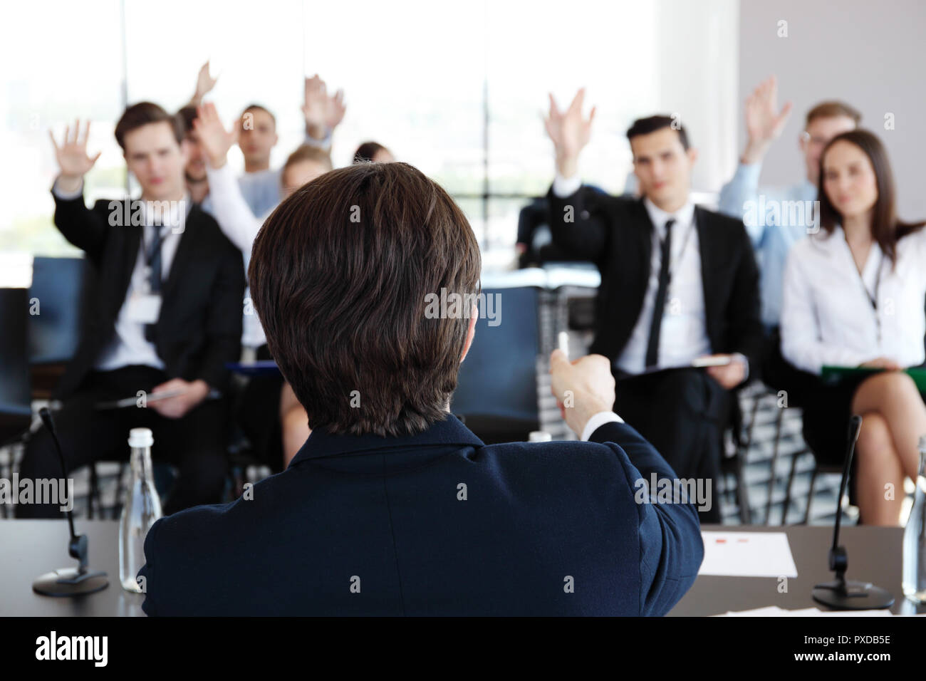 Speaker at business conference and audience asking questions Stock ...