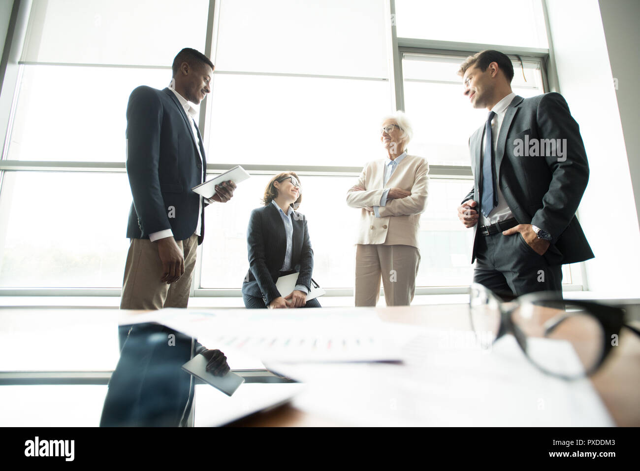 Business professionals sharing ideas Stock Photo - Alamy