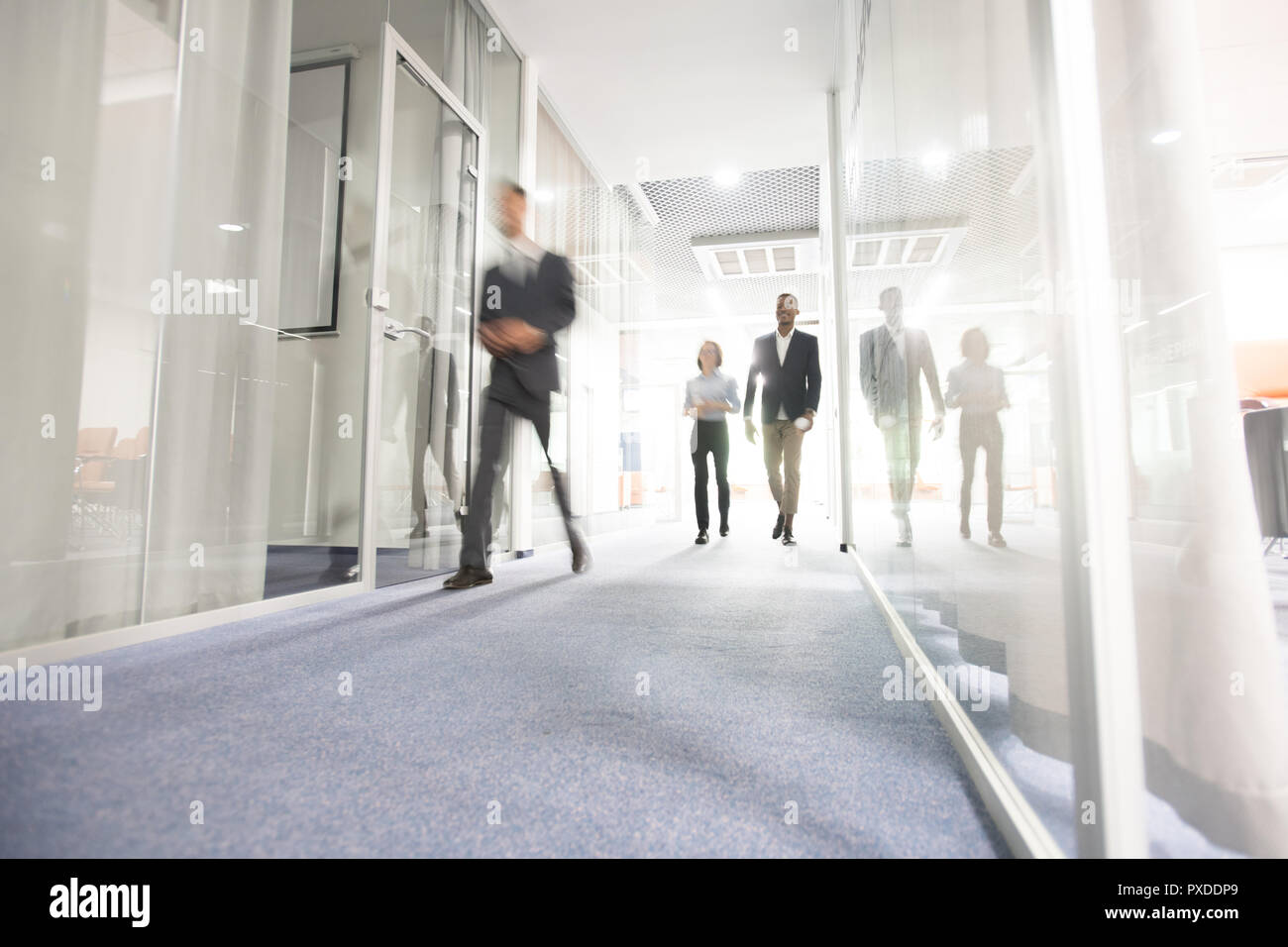 Man walking in office hi-res stock photography and images - Alamy