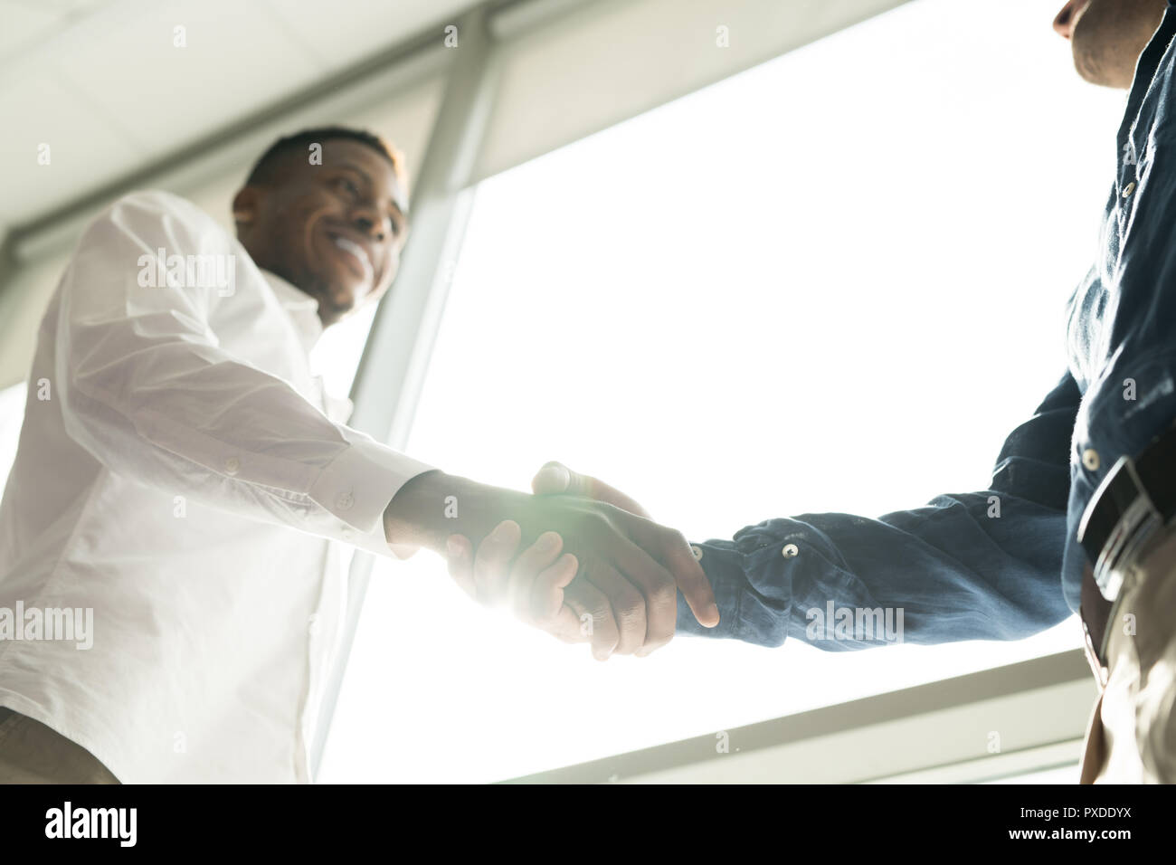 Concluding successful deal with startup company Stock Photo - Alamy