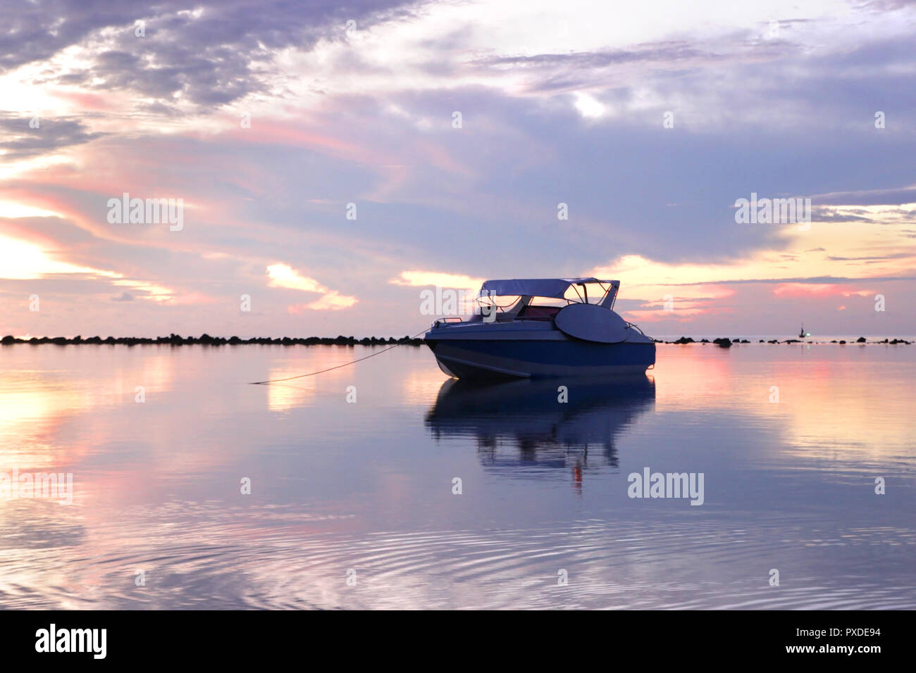 speed boat in the sea with beautiful sunrise background Stock Photo - Alamy