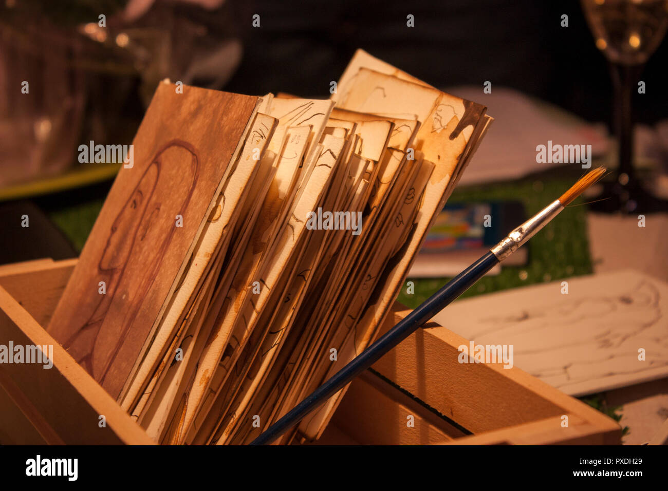 collection of drawings on cardboard stacked in a wooden box Stock Photo ...