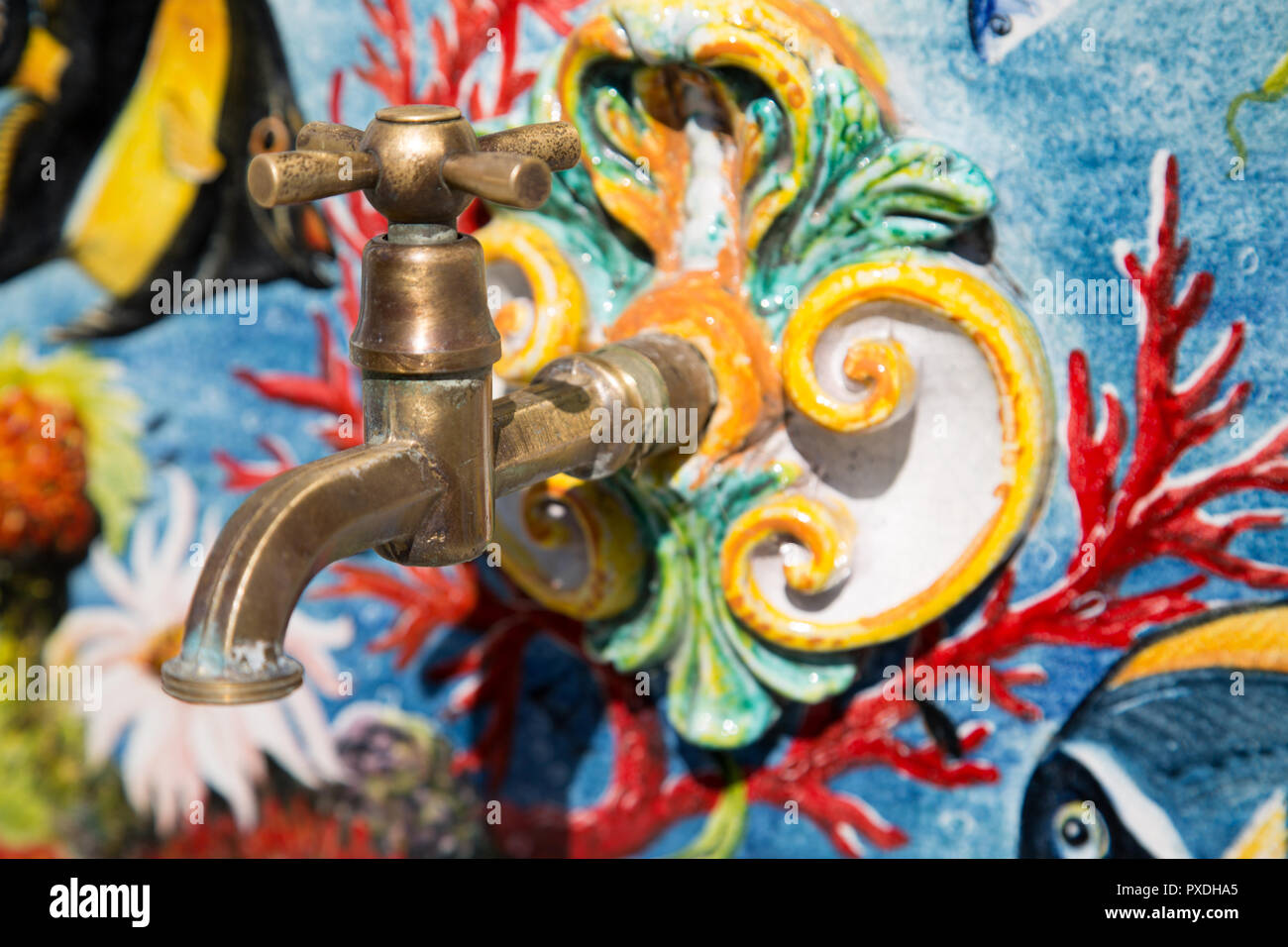 ornate water tap in italy Stock Photo - Alamy