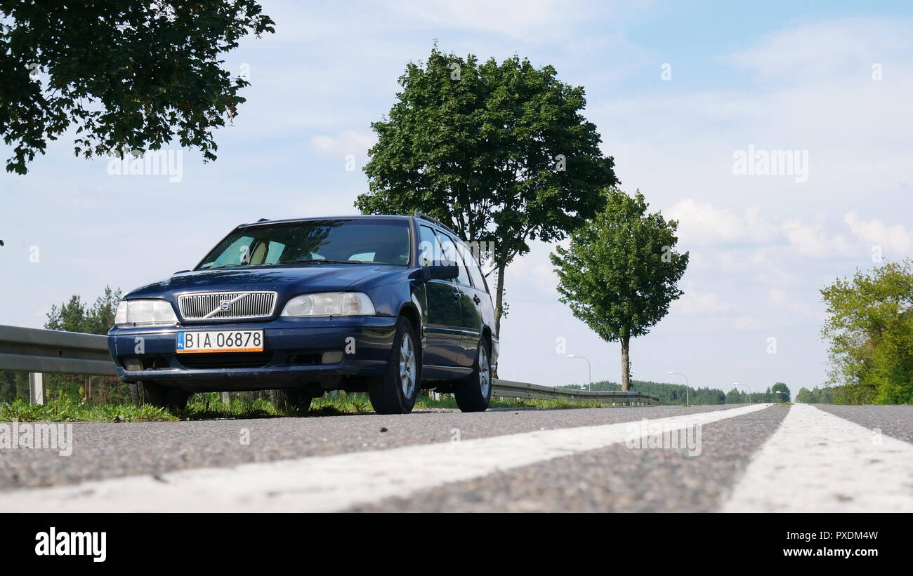 Car on the roadside Stock Photo - Alamy