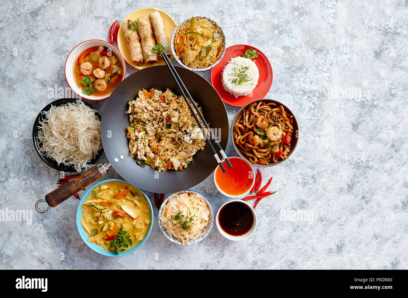 Asian oriental food composition in colorful dishware Stock Photo - Alamy