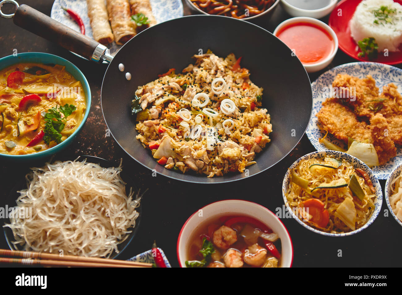 Asian oriental food composition in colorful dishware Stock Photo - Alamy