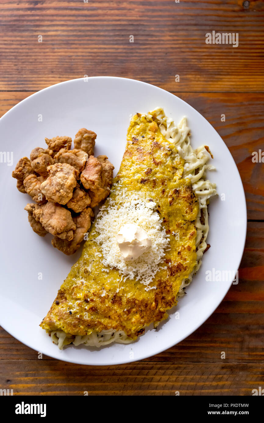 VENEZUELAN FOOD. Corn CACHAPA with cheese and fried pork - cochino ...