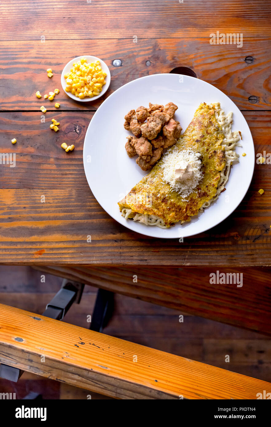 VENEZUELAN FOOD. Corn CACHAPA with cheese and fried pork - cochino ...