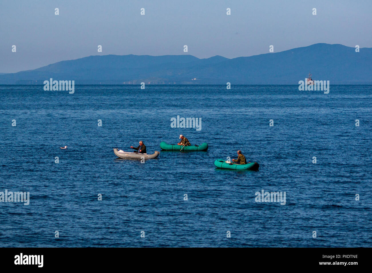 Fishermen on inflatable boats hi-res stock photography and images - Alamy