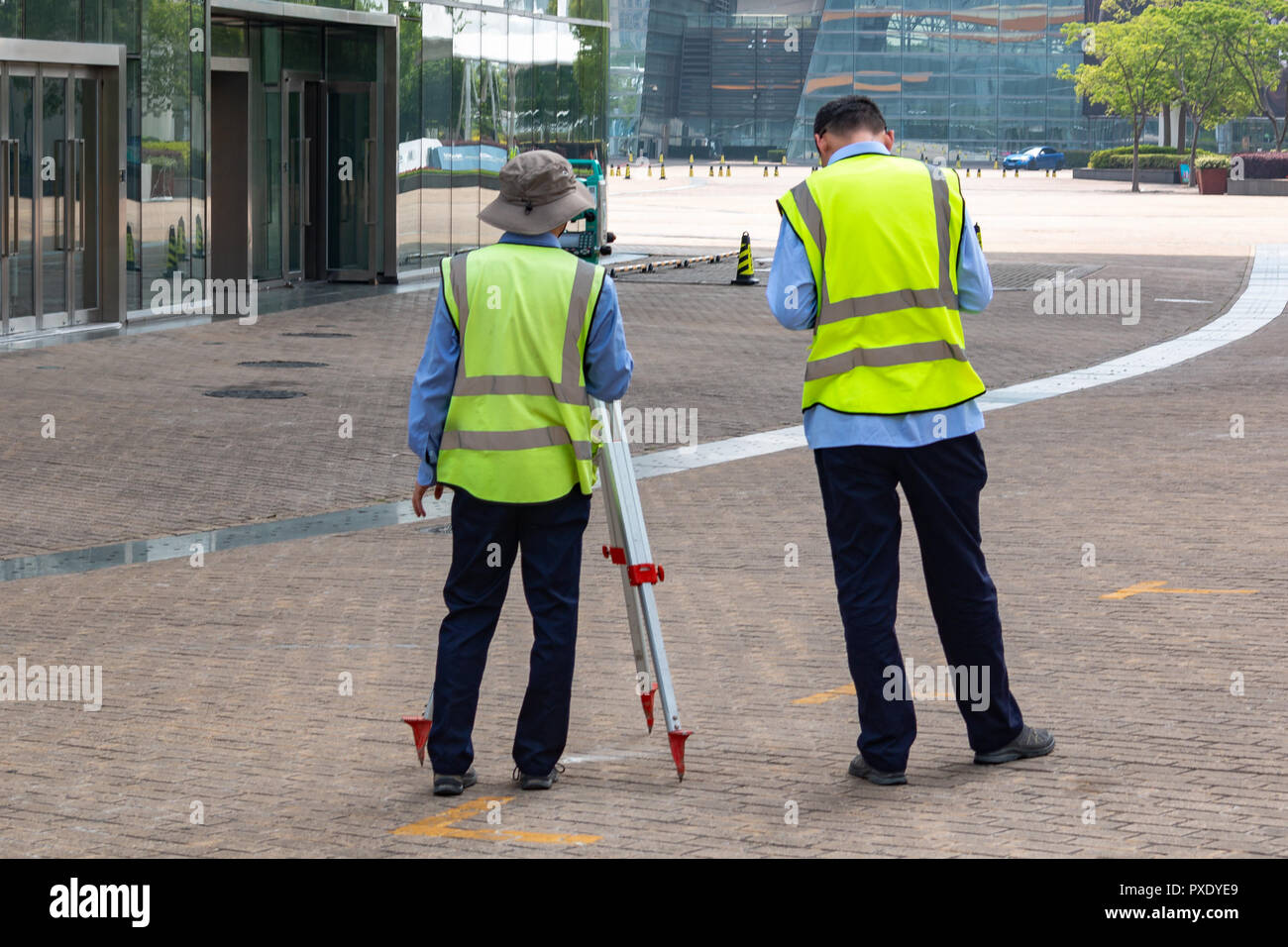 Surveyor builder Engineers working with survey equipment theodolite on ...