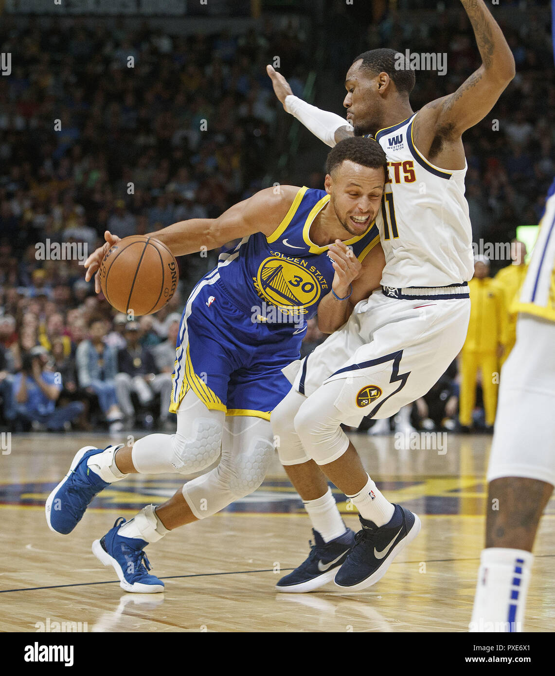 Denver, Colorado, USA. 21st Oct, 2018. Warriors STEPHEN CURRY, left ...