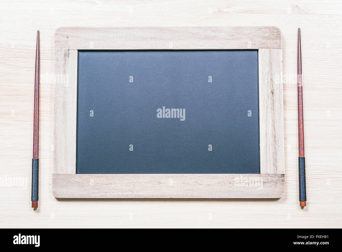 Blackboard With Wooden Frame And Copy Space For A Menu Next To Two ... Blackboard With Wooden Frame And Copy Space For A Menu Next To Two ...