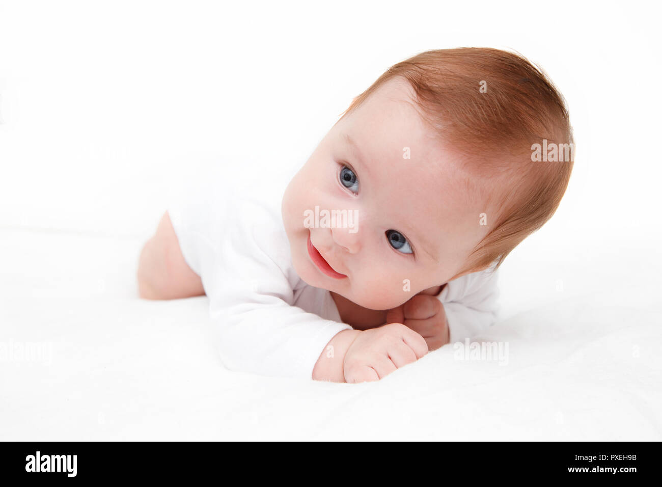 Cute crawling baby girl Stock Photo - Alamy