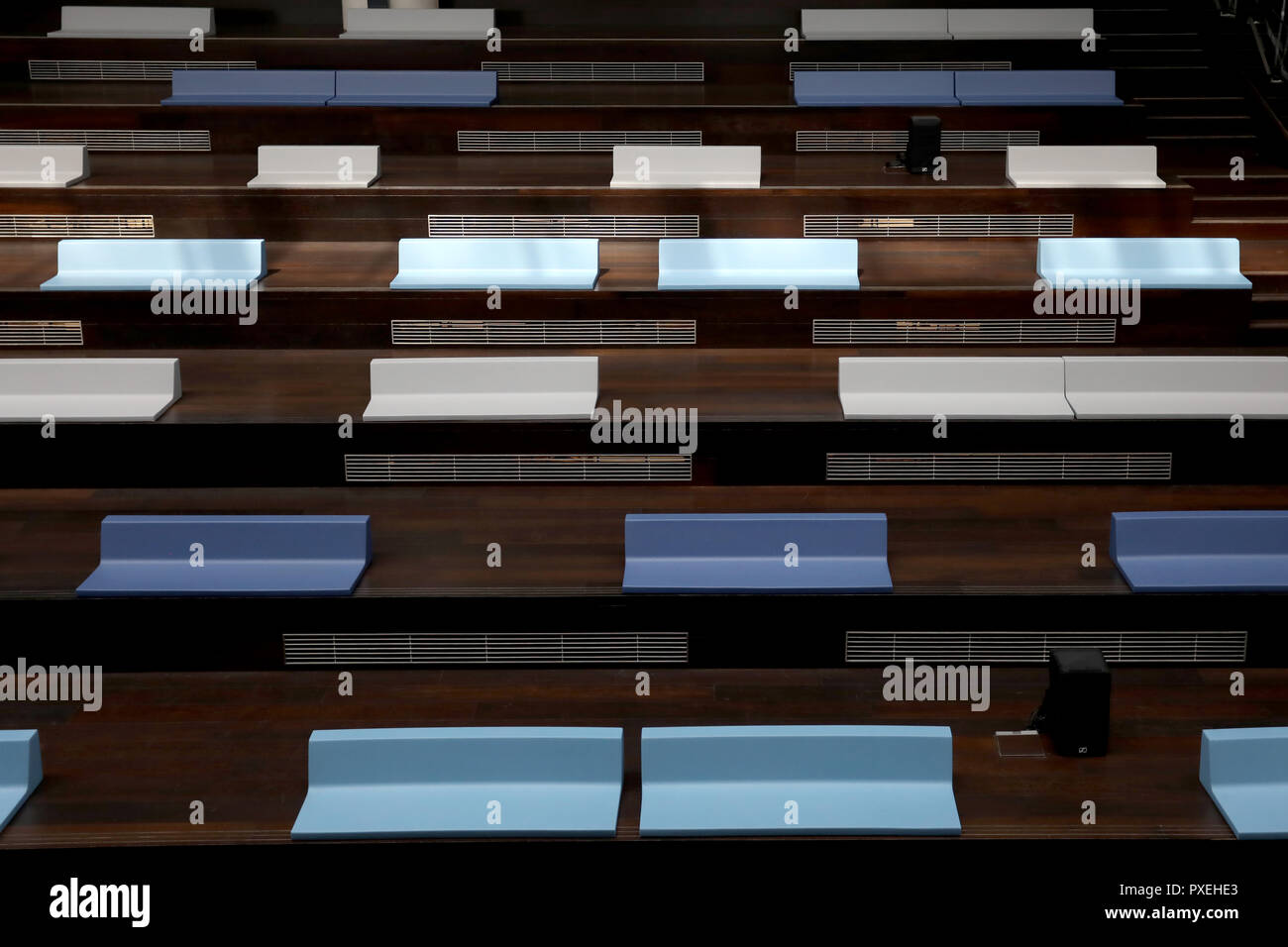 Coloured seating inside the auditorium of the Qatar National Library in ...