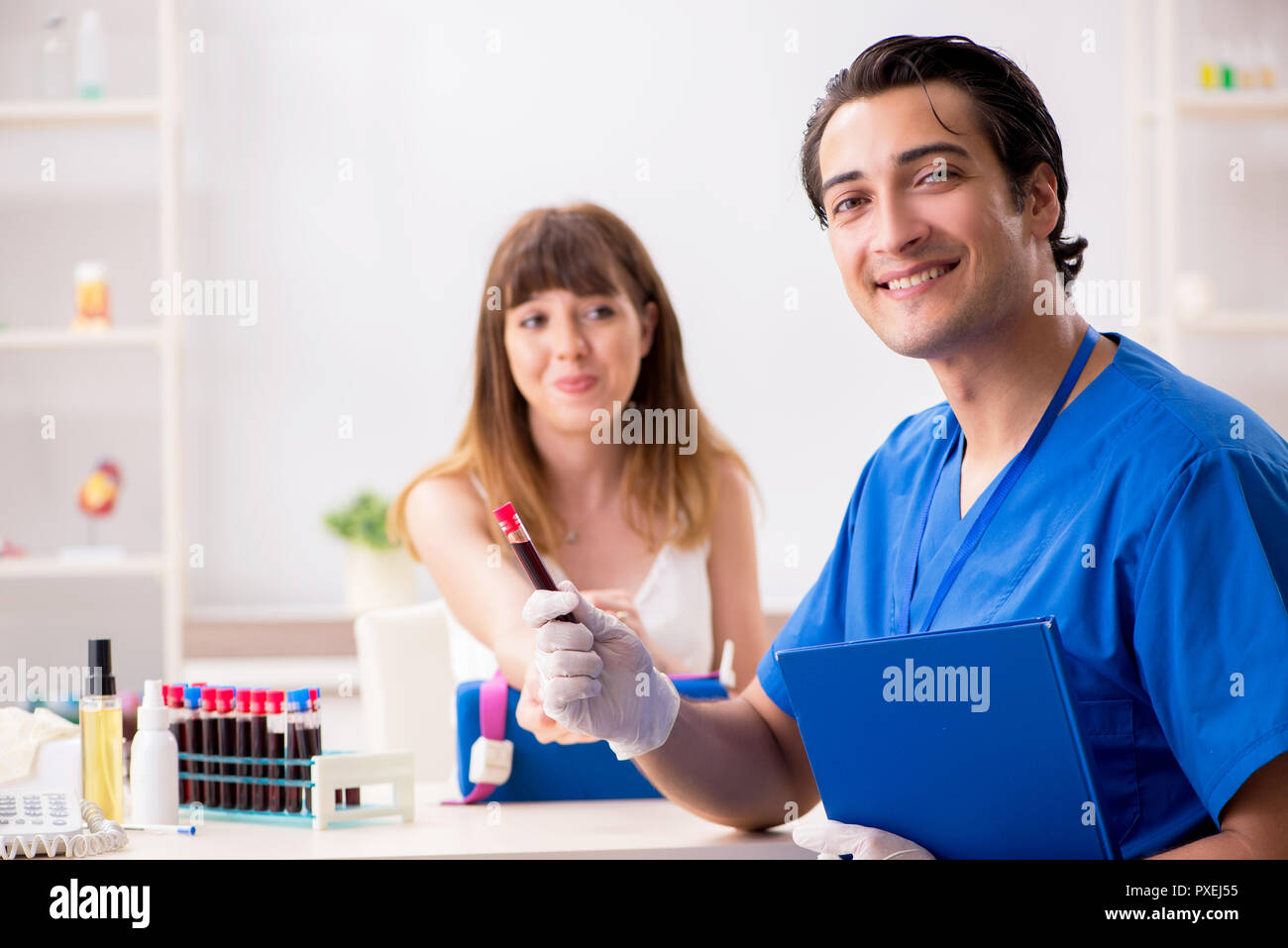 Young patient during blood test sampling procedure Stock Photo - Alamy