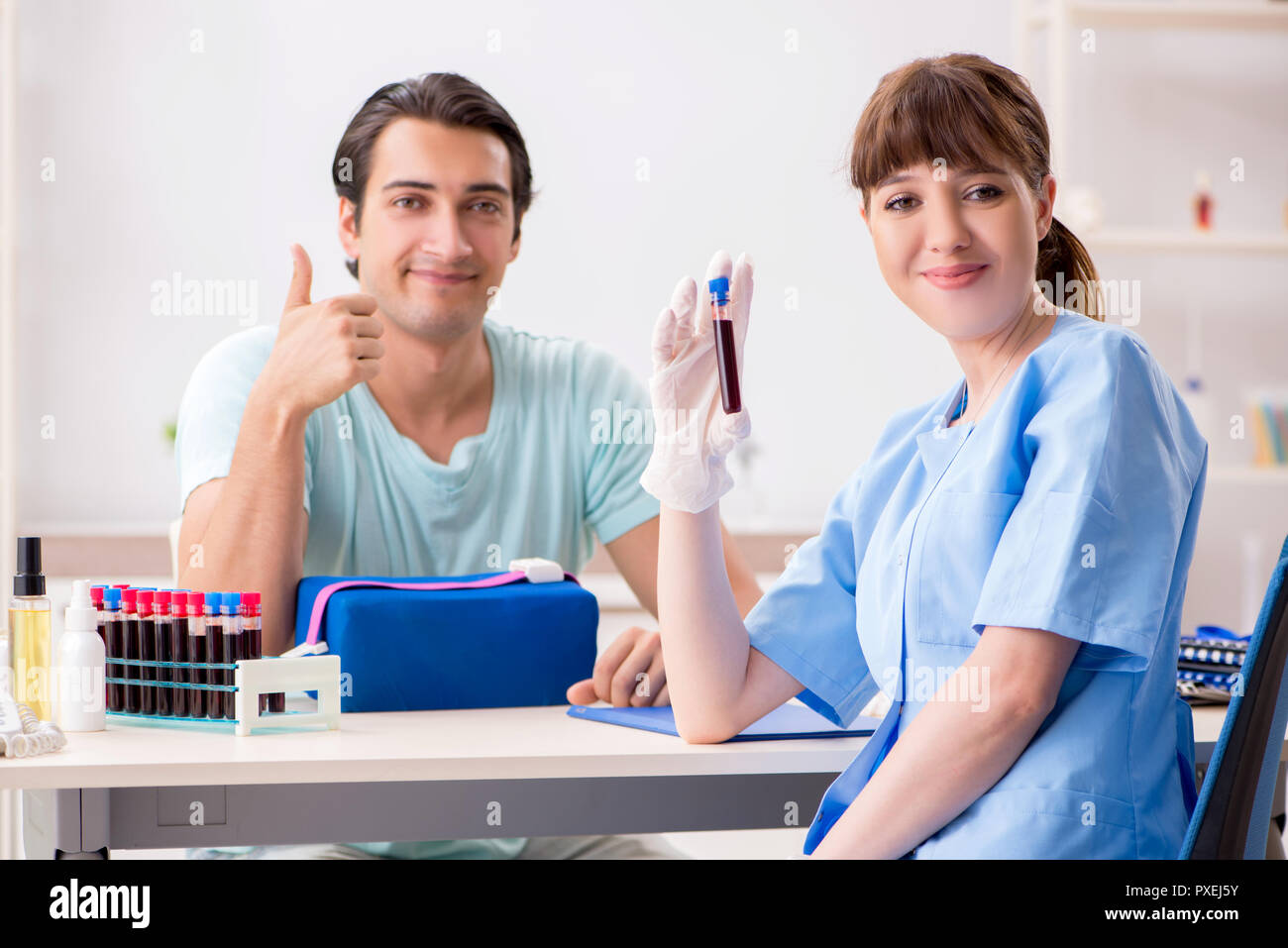 Young patient during blood test sampling procedure Stock Photo - Alamy