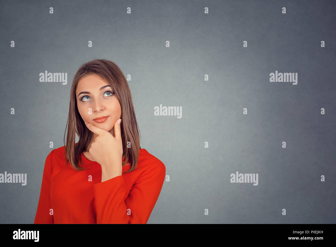 woman thinking looking up Stock Photo - Alamy