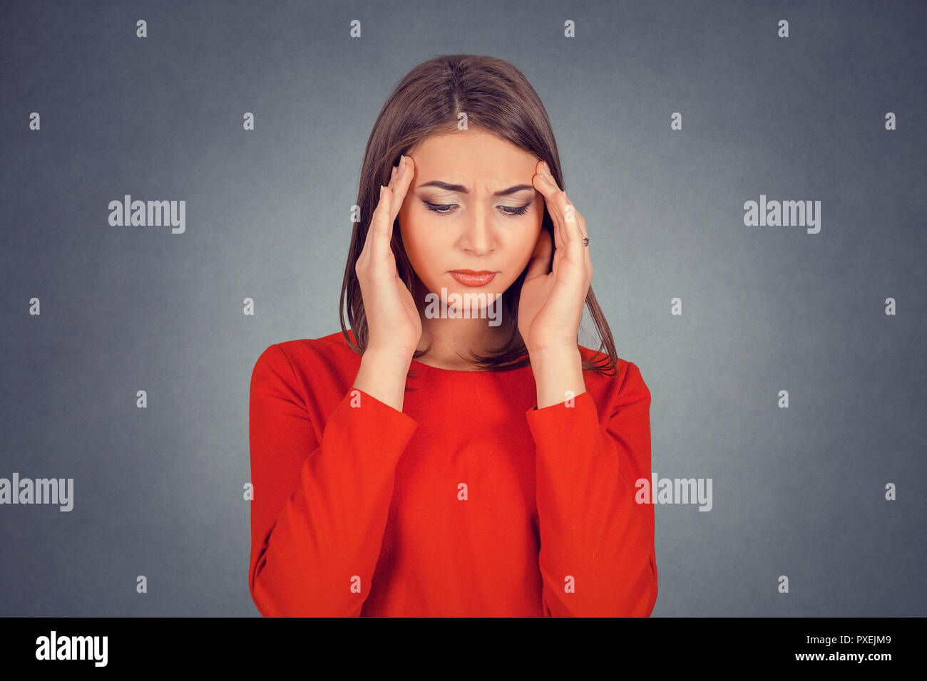 sad woman with worried stressed face expression looking down Stock ...