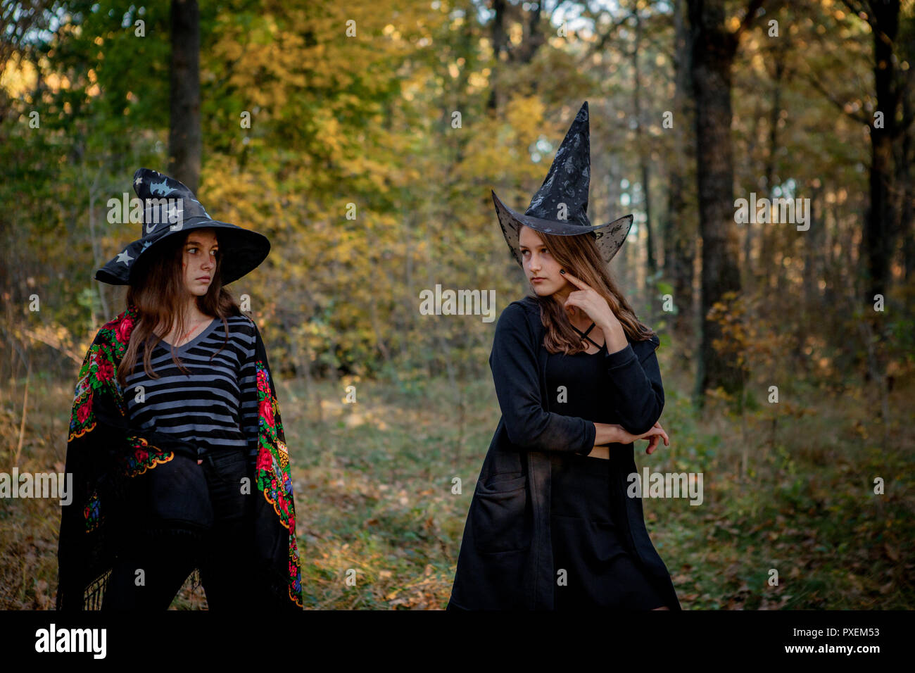 Halloween Maniac and Witch in the Forest. Teenagers in Halloween ...