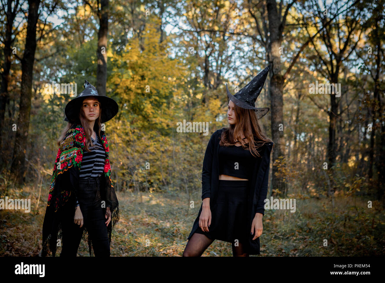 Halloween Maniac and Witch in the Forest. Teenagers in Halloween ...