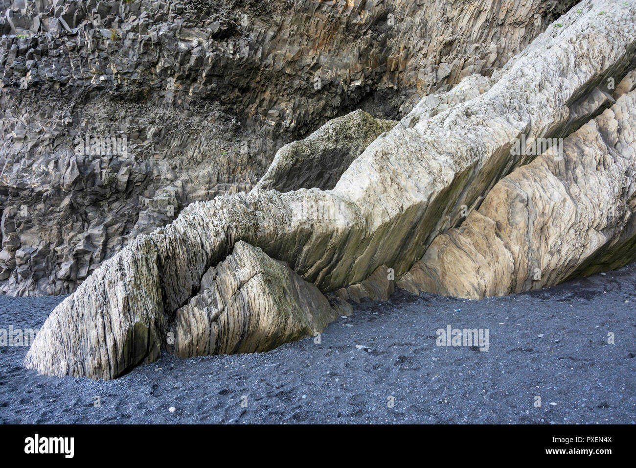 Reynisfjara black sand beach with amazing columnar basalt formations, a ...