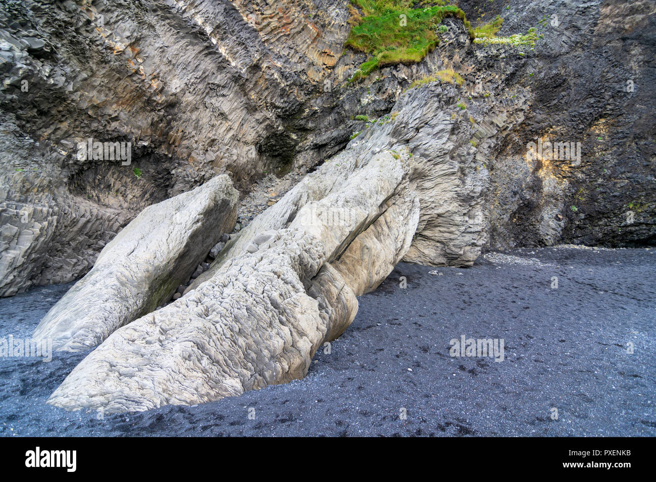 Reynisfjara black sand beach with amazing columnar basalt formations, a ...
