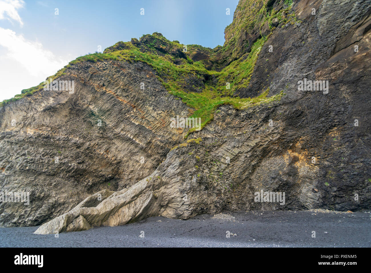 Reynisfjara black sand beach with amazing columnar basalt formations, a ...