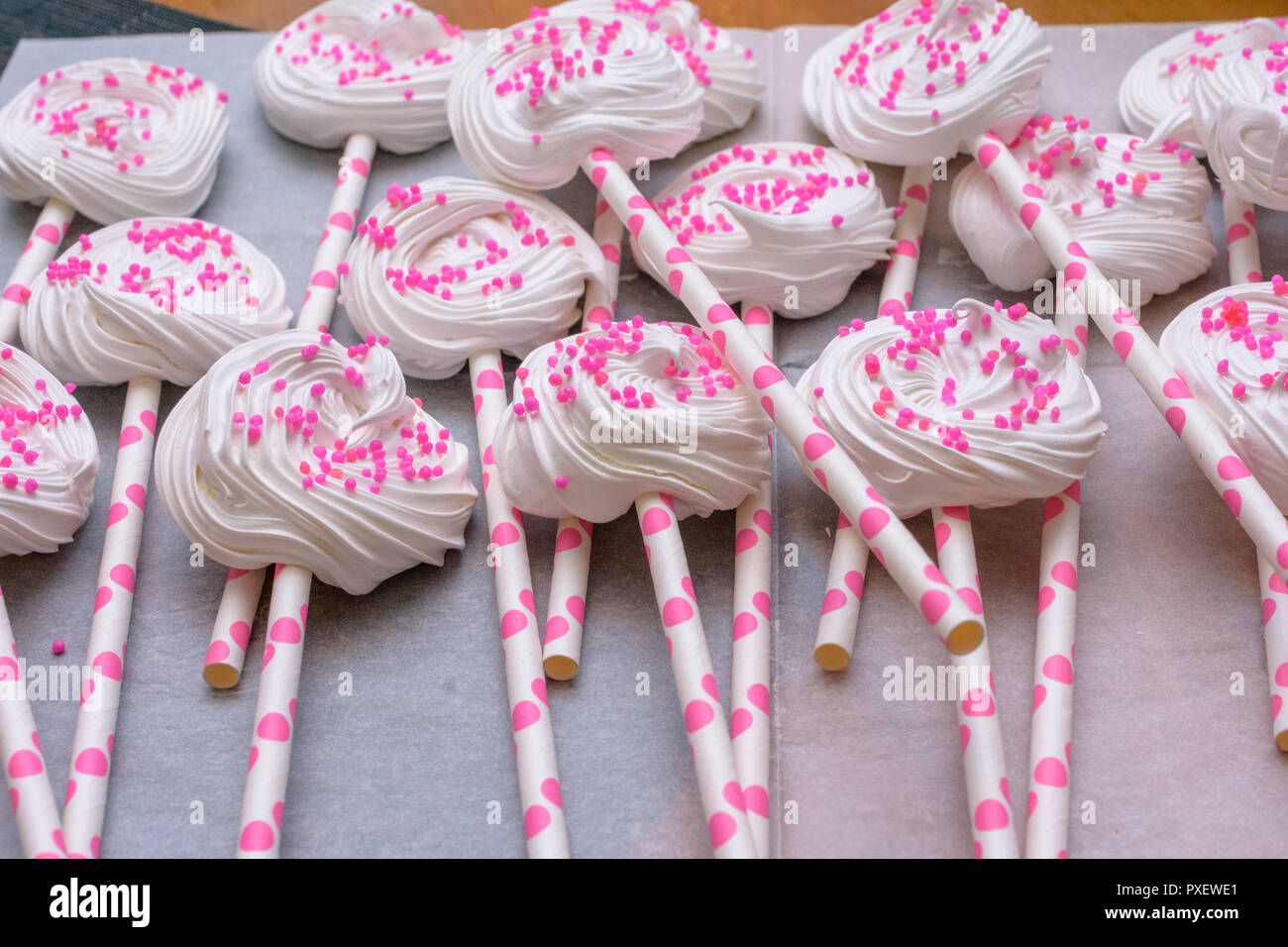 Home-made merangue candy on a stick for a Sweet Sixteen birthday party ...