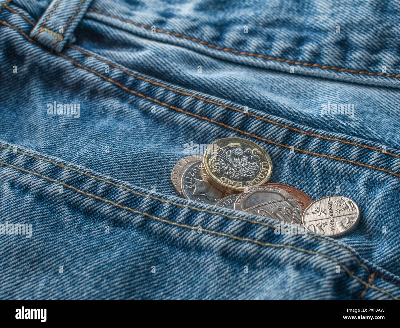 Small change in pocket hi-res stock photography and images - Alamy