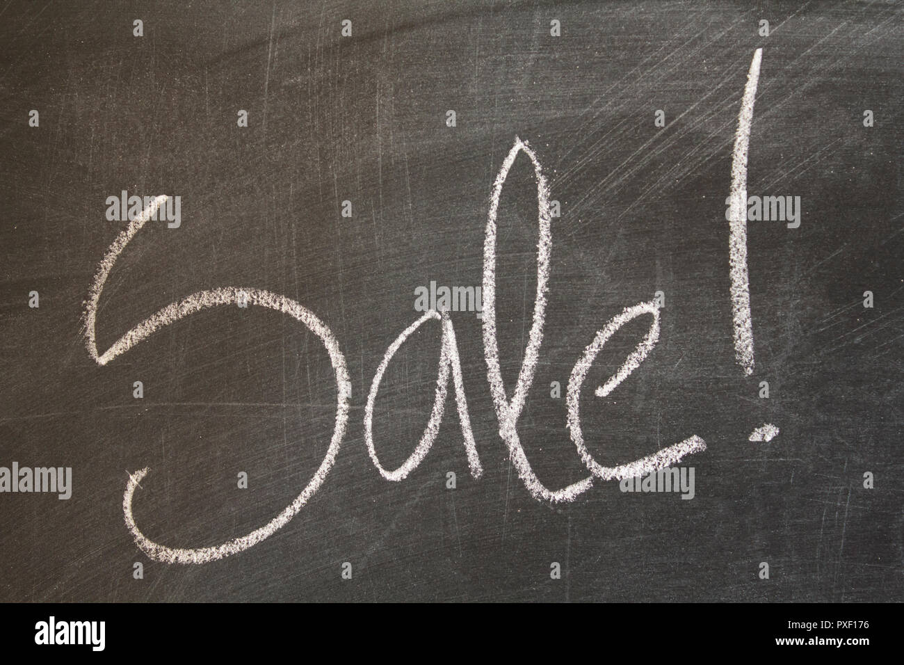 Sale written on chalkboard Stock Photo - Alamy