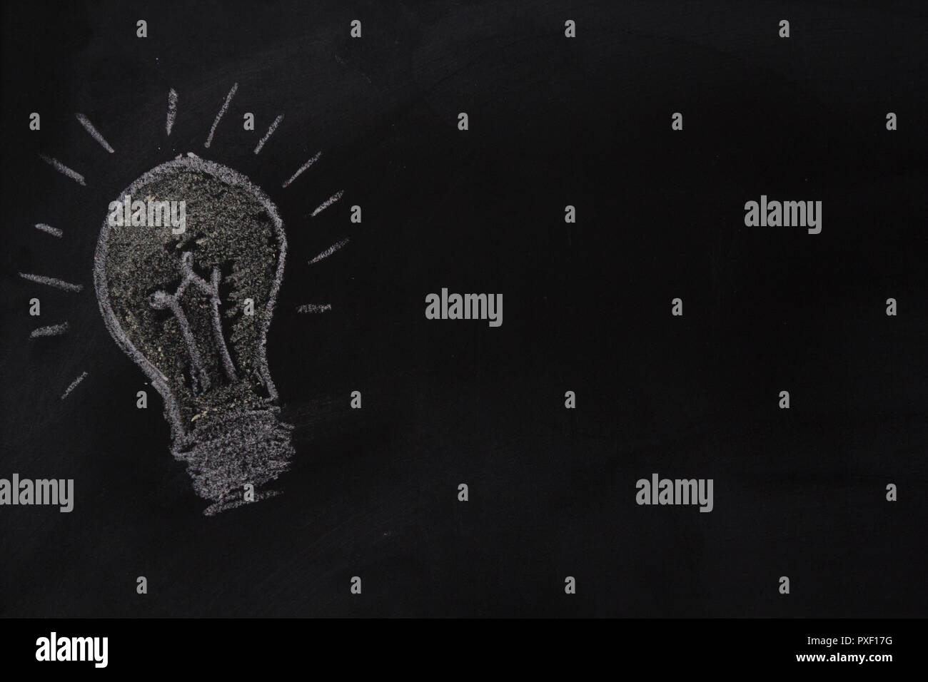 Drawing lamp on chalkboard. Idea and Creativity Concept Stock Photo - Alamy