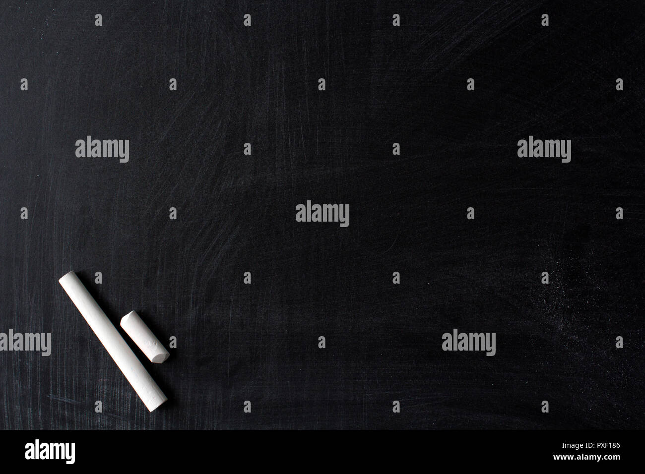 Dirty blackboard and white chalk Stock Photo - Alamy