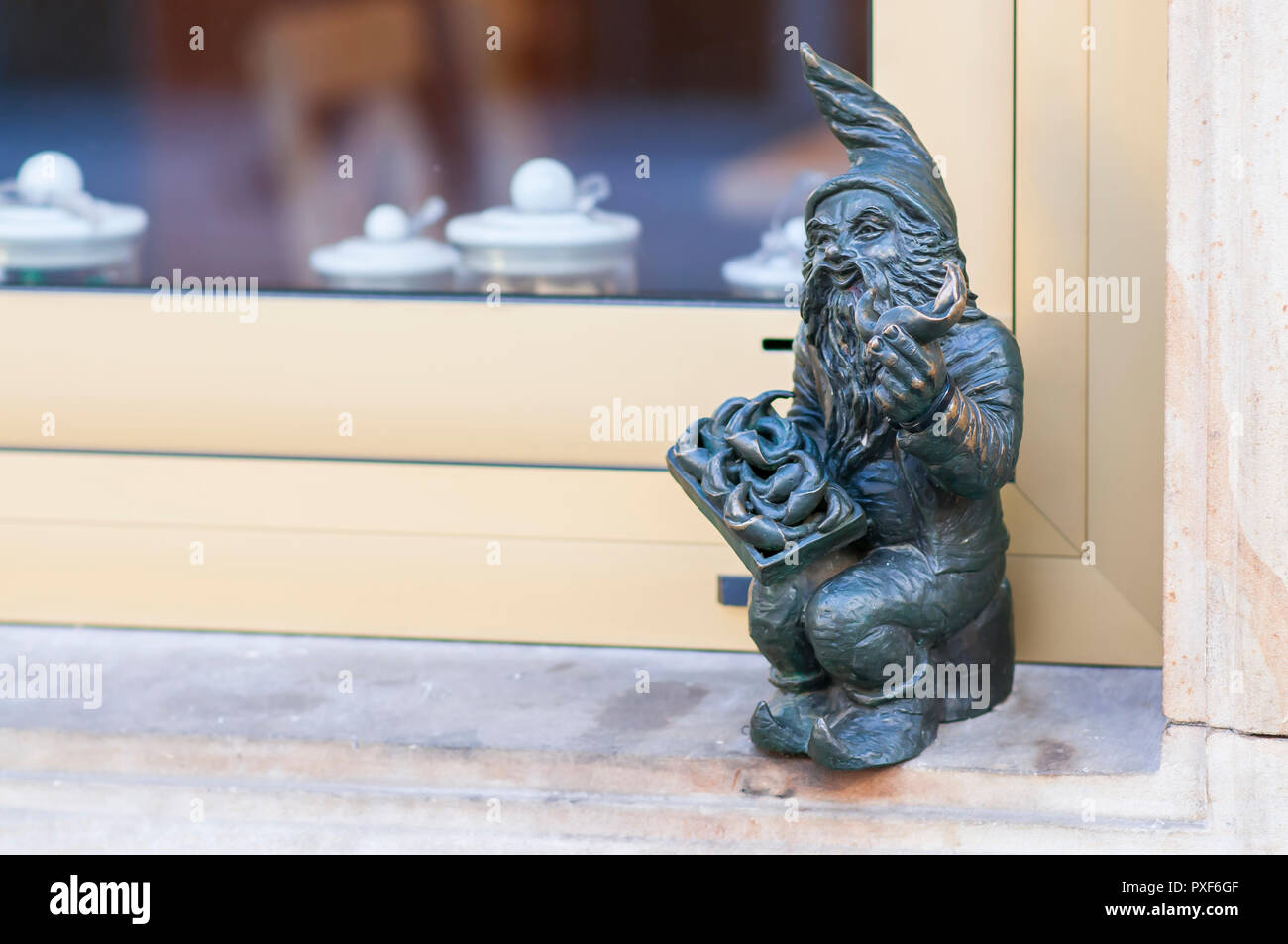 Wroclaw Famous Dwarf, "Rogalik" gnome statue, Poland Stock Photo - Alamy