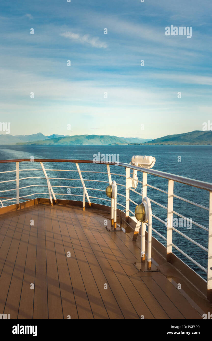 Exterior white metal light fixture and railing, port side on a cruise ...