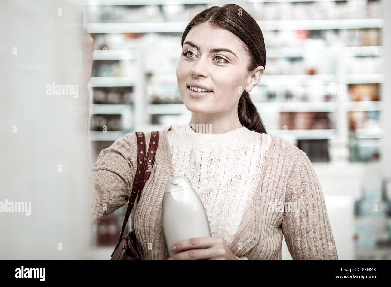 Woman shopping pharmacy vitamins hi-res stock photography and images ...