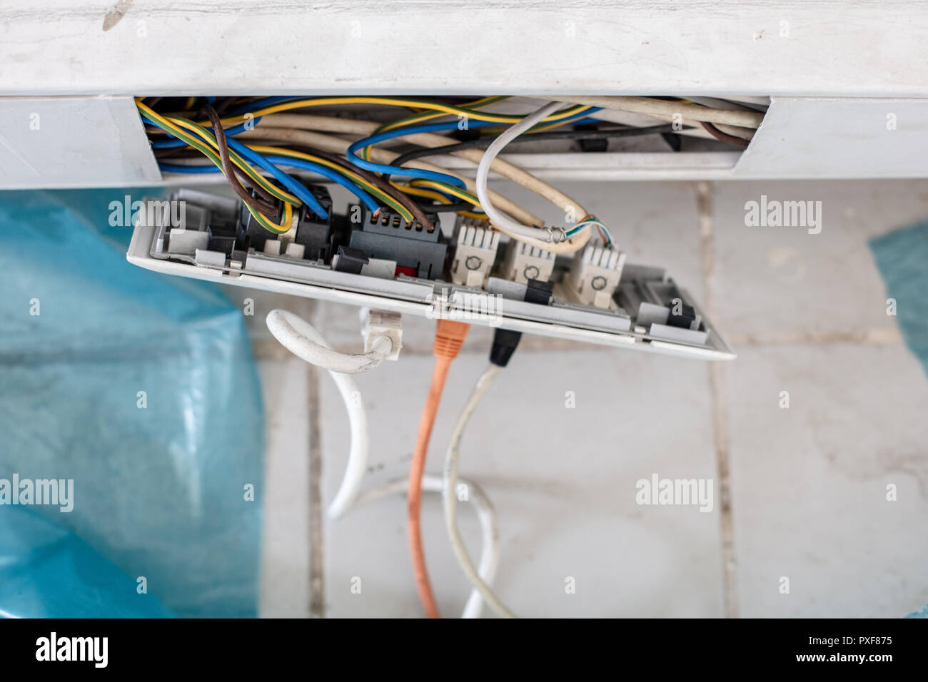 Plactic cable channel while repairing with electrical outlets on where ...