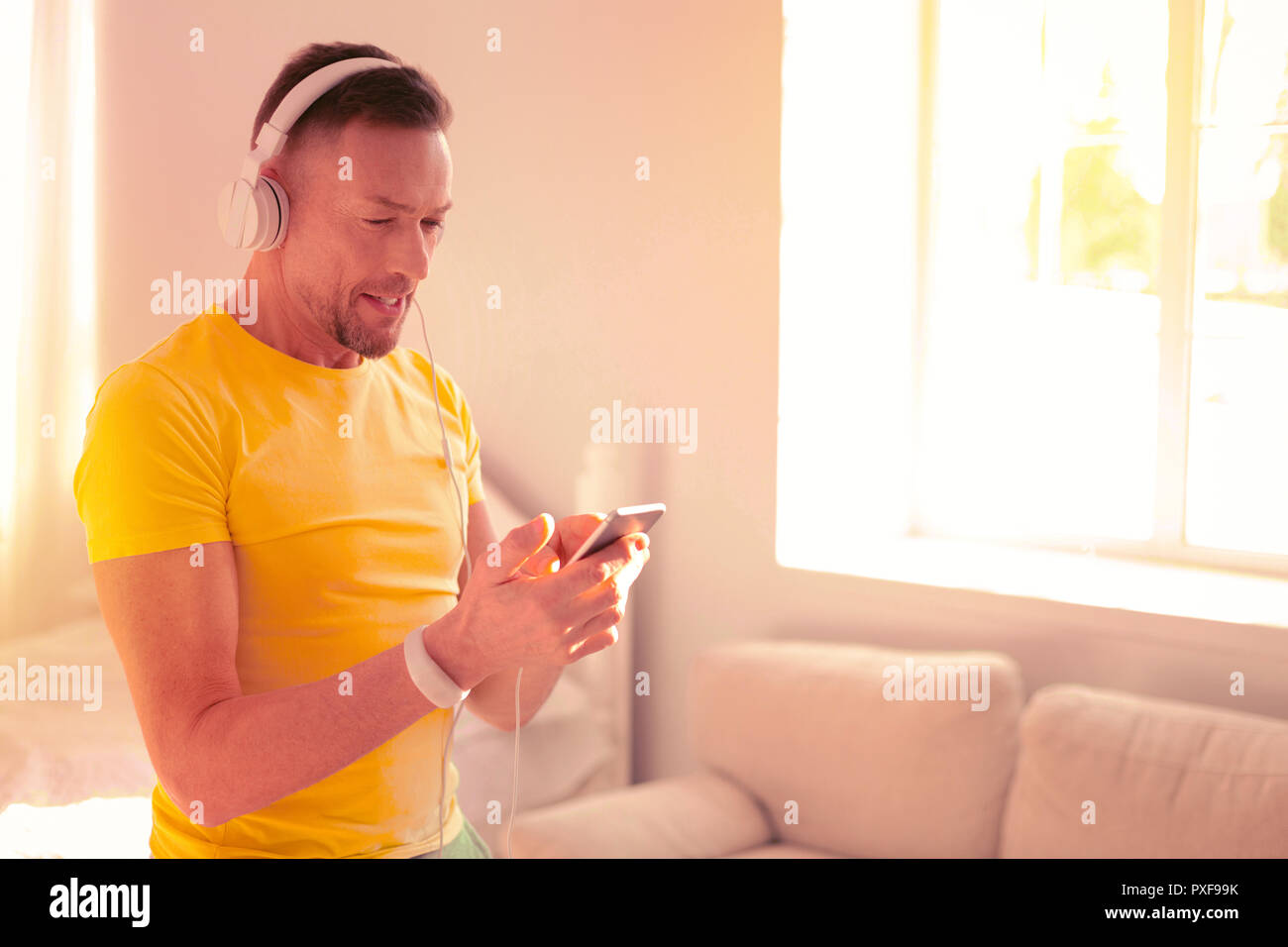 Relaxed handsome man chatting on social media Stock Photo - Alamy