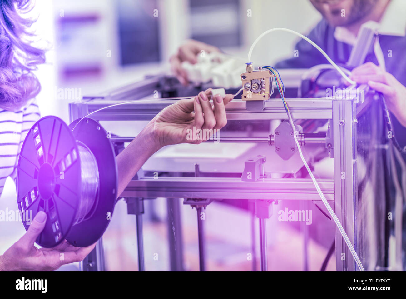 Woman plugging computer hi-res stock photography and images - Alamy