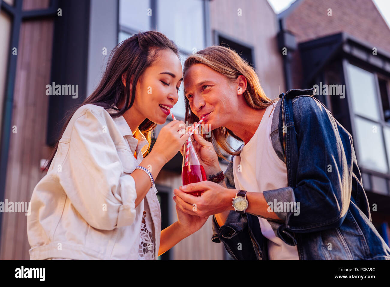 Nice positive couple having a romantic date Stock Photo - Alamy