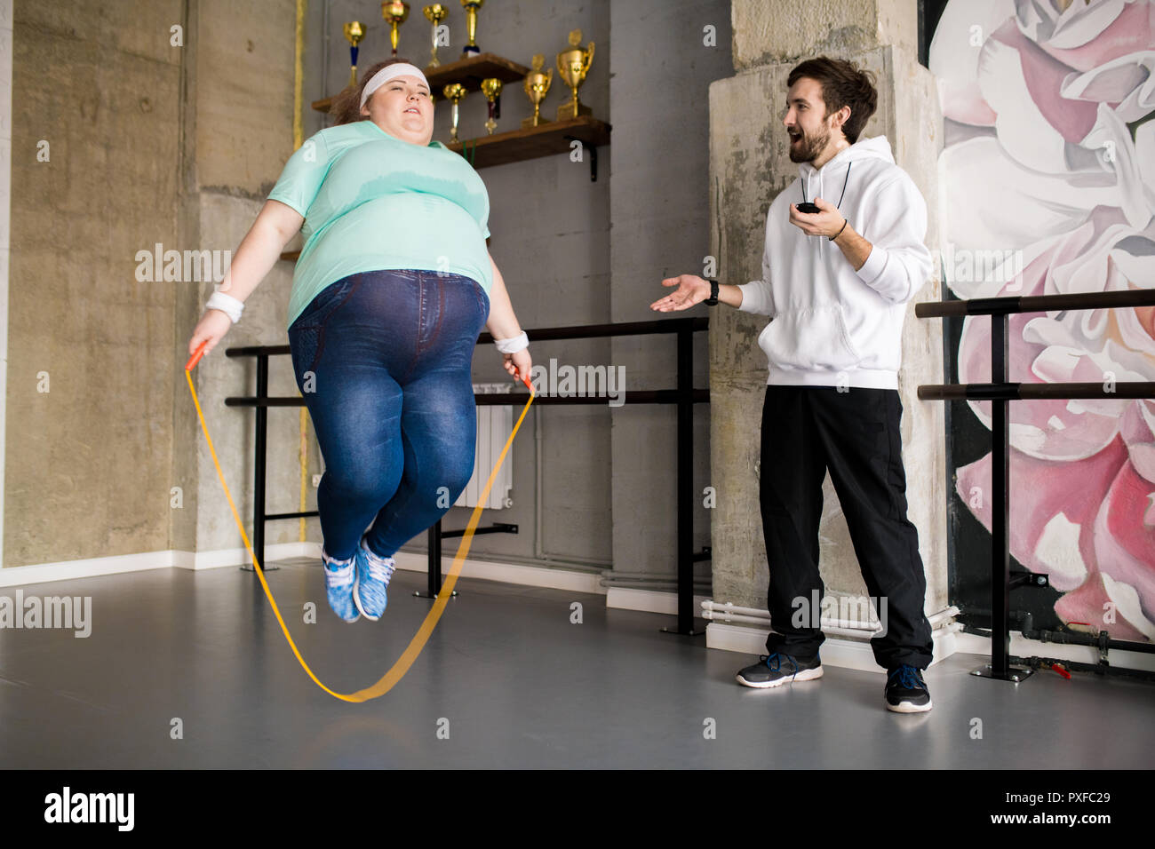 Coach Training Obese Woman Stock Photo - Alamy
