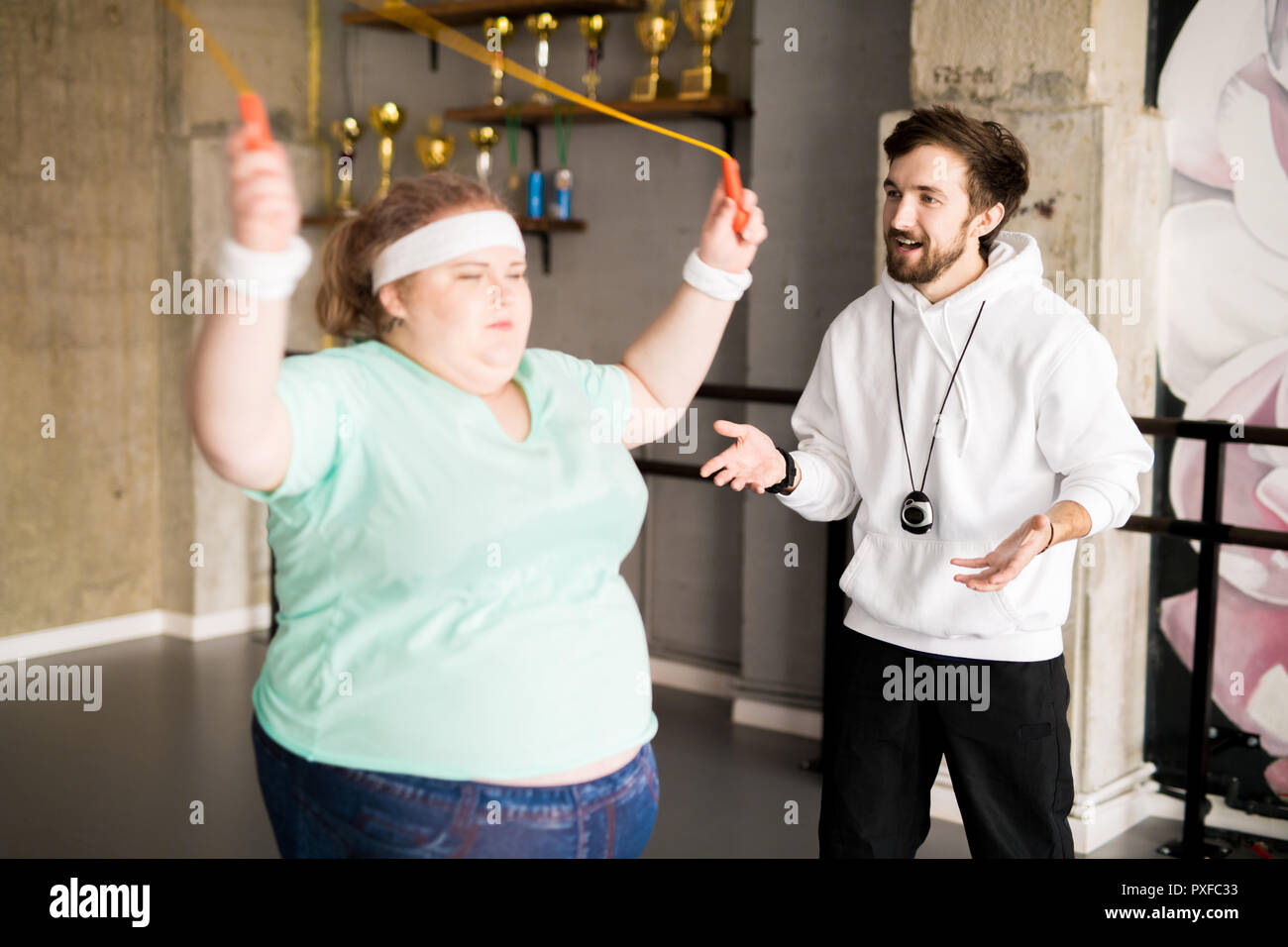 Fitness Coach Training Obese Woman Stock Photo - Alamy
