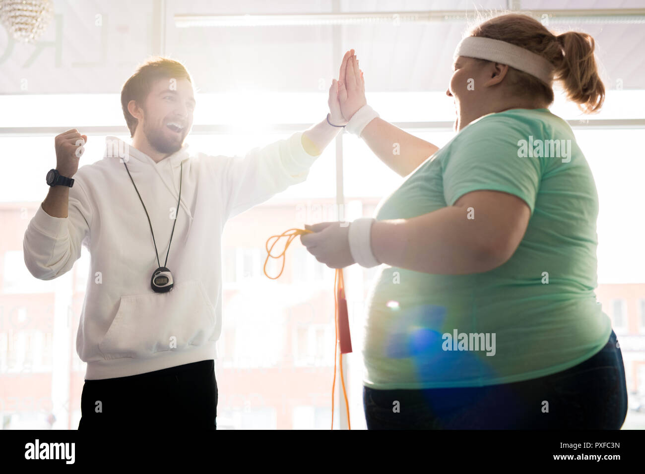 Happy training hi-res stock photography and images - Alamy