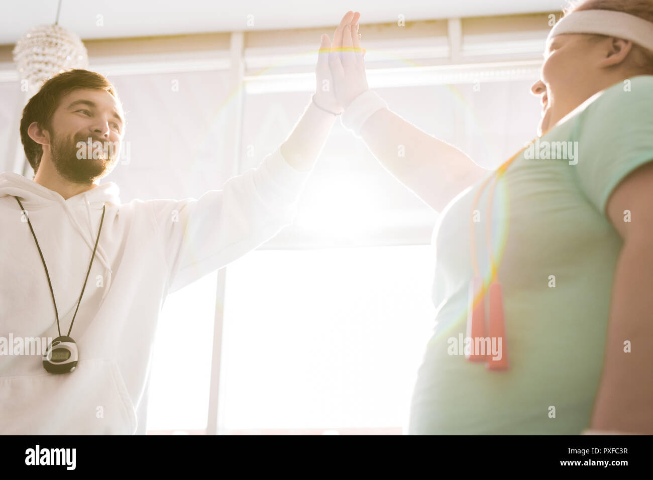 High Five with Coach Stock Photo - Alamy